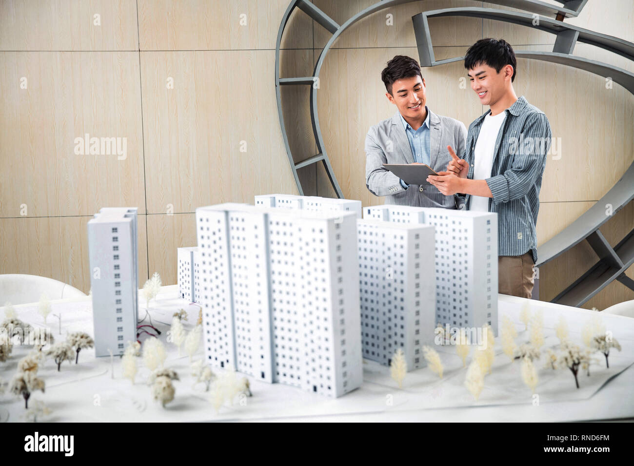 Business men in the sales center Stock Photo - Alamy