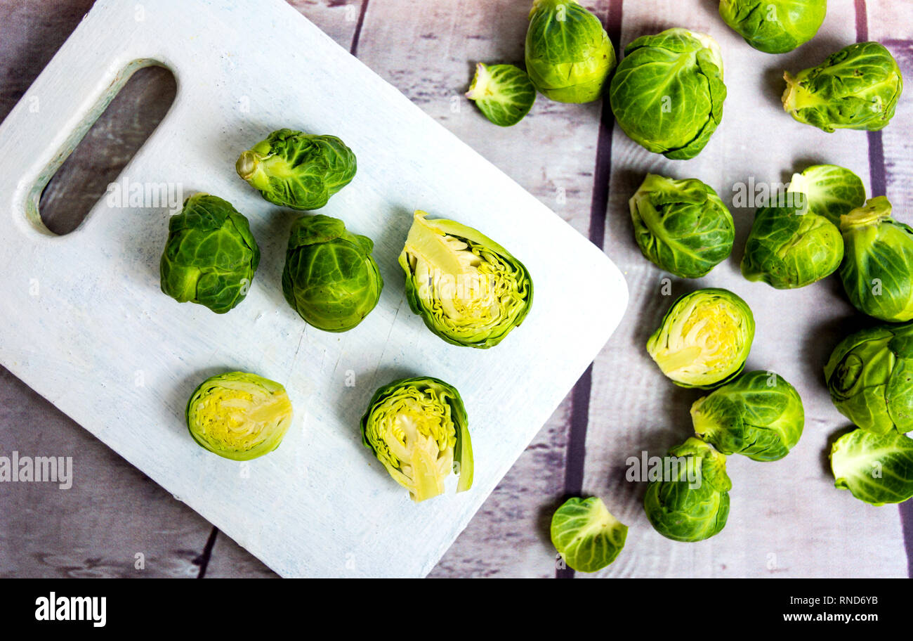 Brussels sprout vegetables on a cutting board top view Stock Photo - Alamy