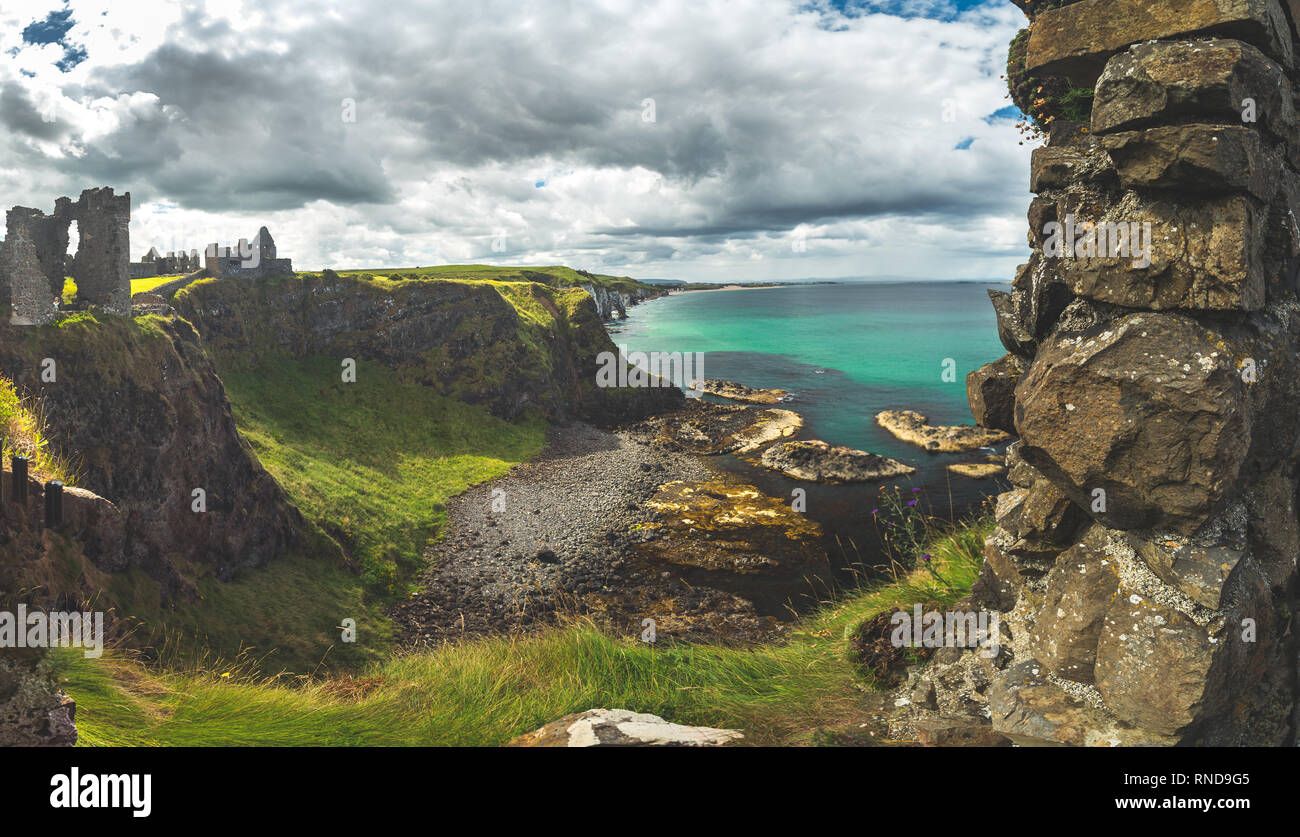 The overview from Dunluce castle to the Irish bay. Overwhelming ...