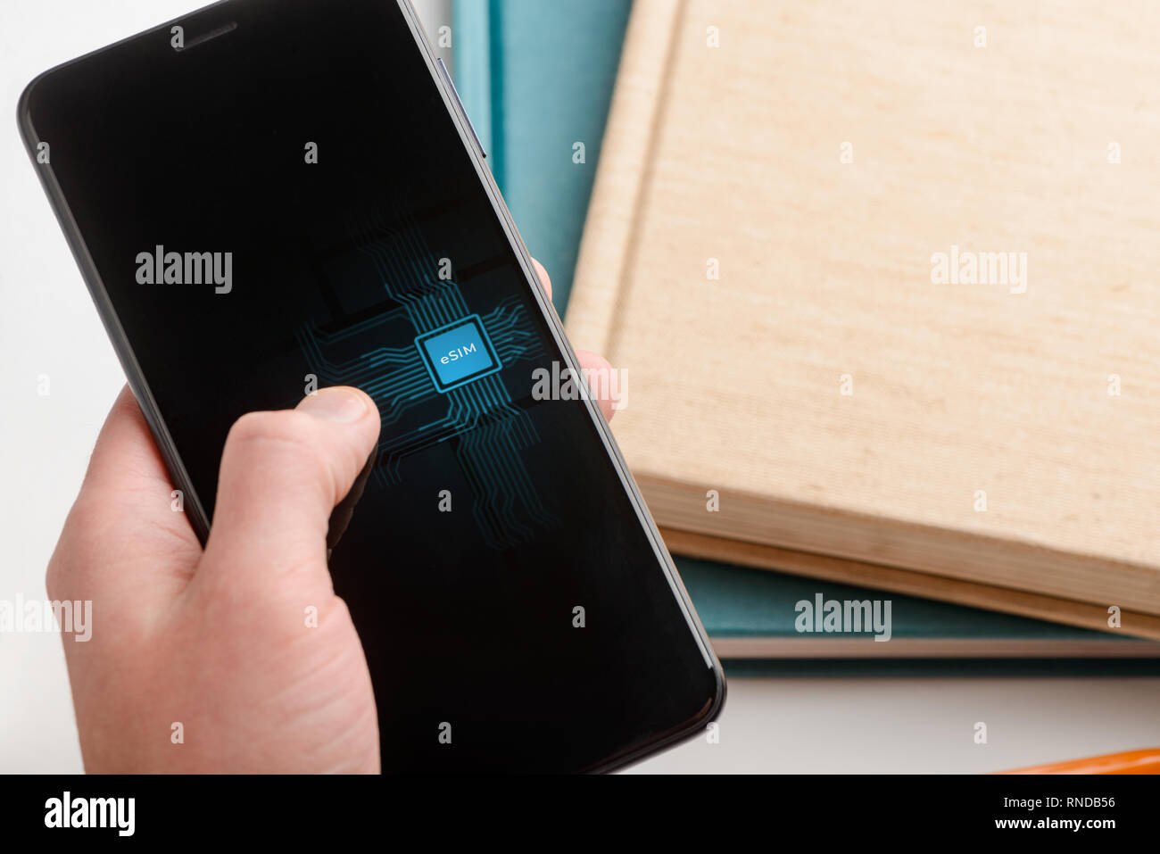 Hand holding a mobile phone Stock Photo - Alamy