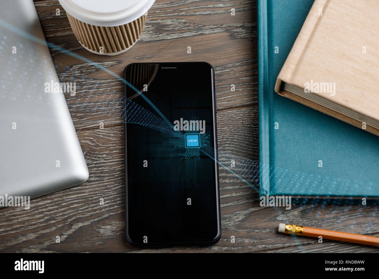 Cell phone with embedded SIM Stock Photo - Alamy