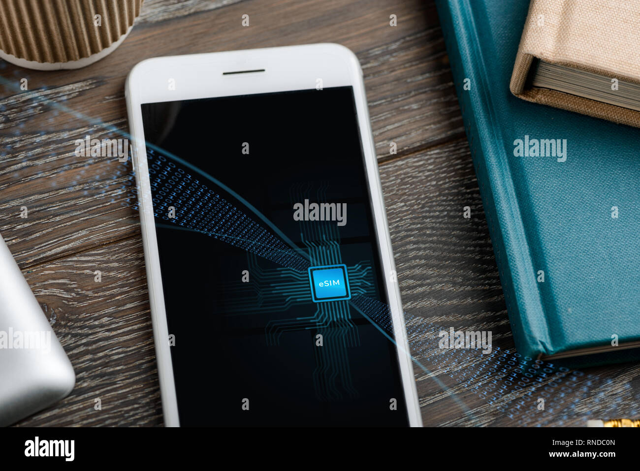 Mobile phone with embedded SIM Stock Photo - Alamy