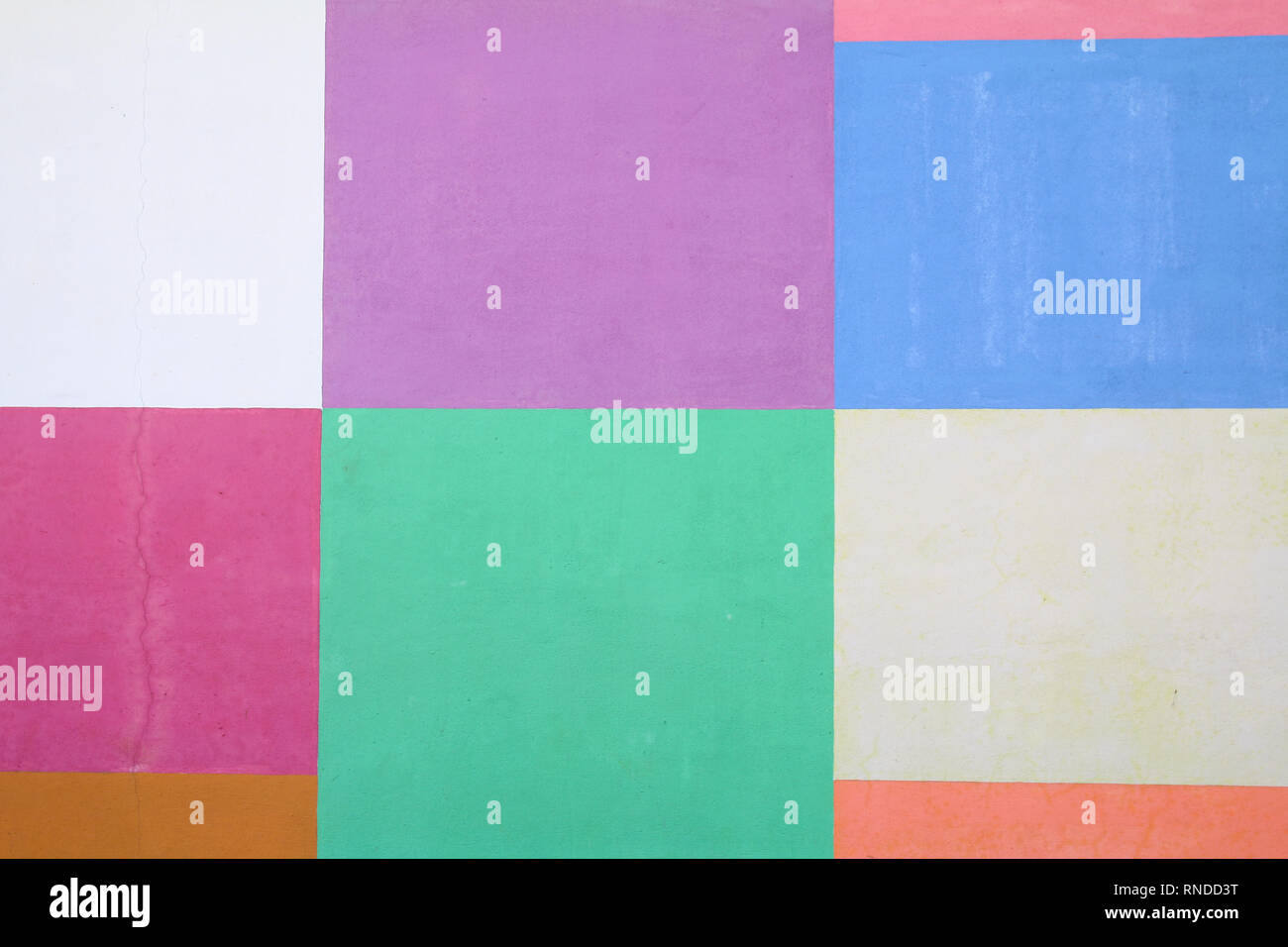 Painted various shape and color of squares on the wall Stock Photo - Alamy