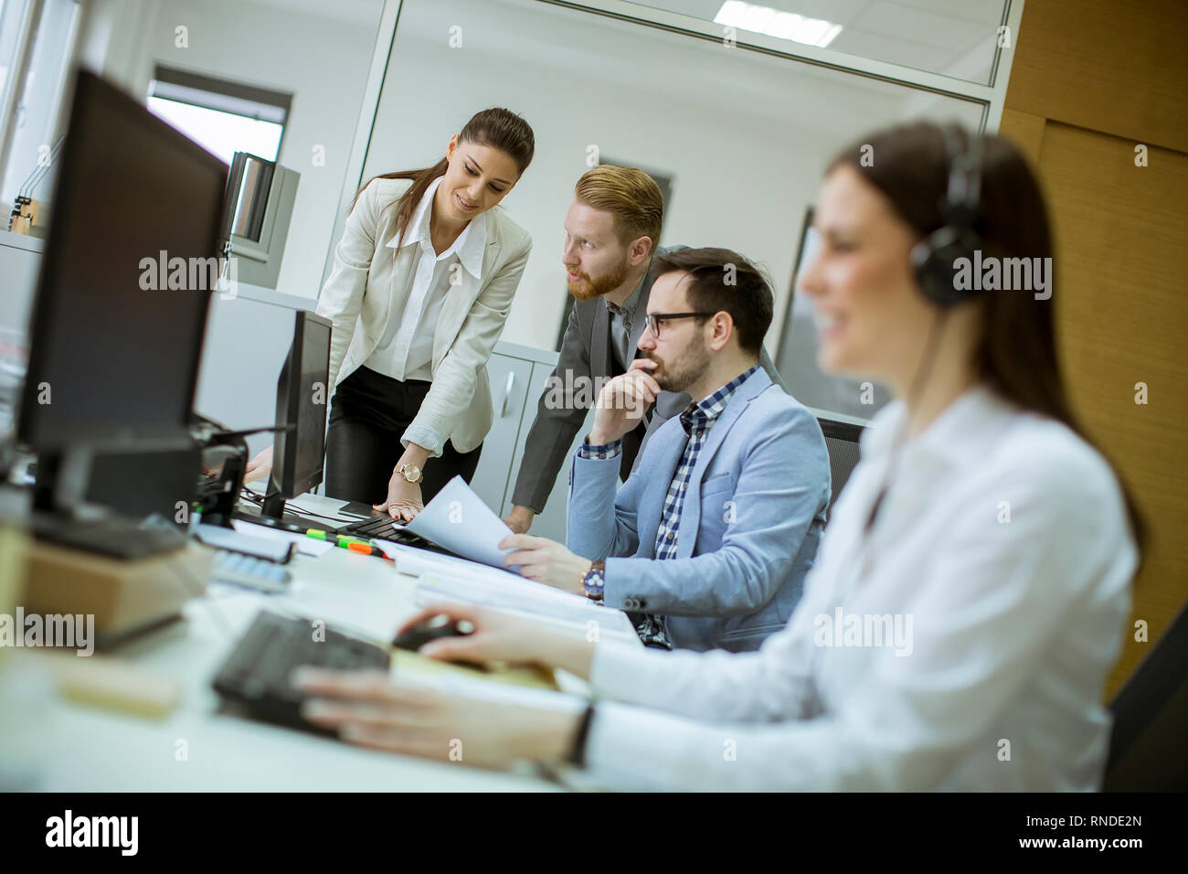 People working in a busy office as a teamwork concept Stock Photo - Alamy
