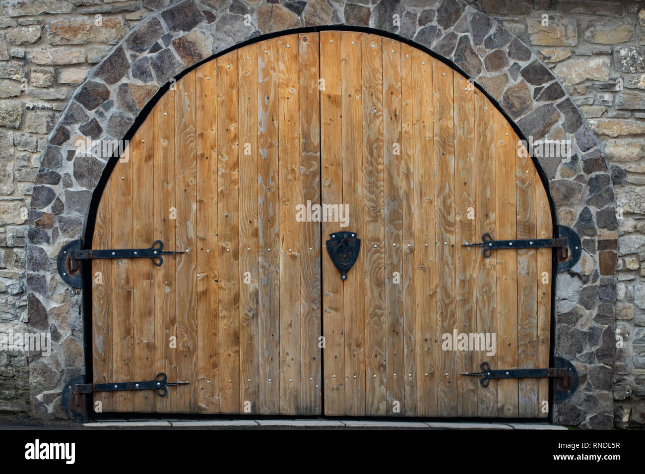 wooden gate with wrought iron elements close up Stock Photo - Alamy