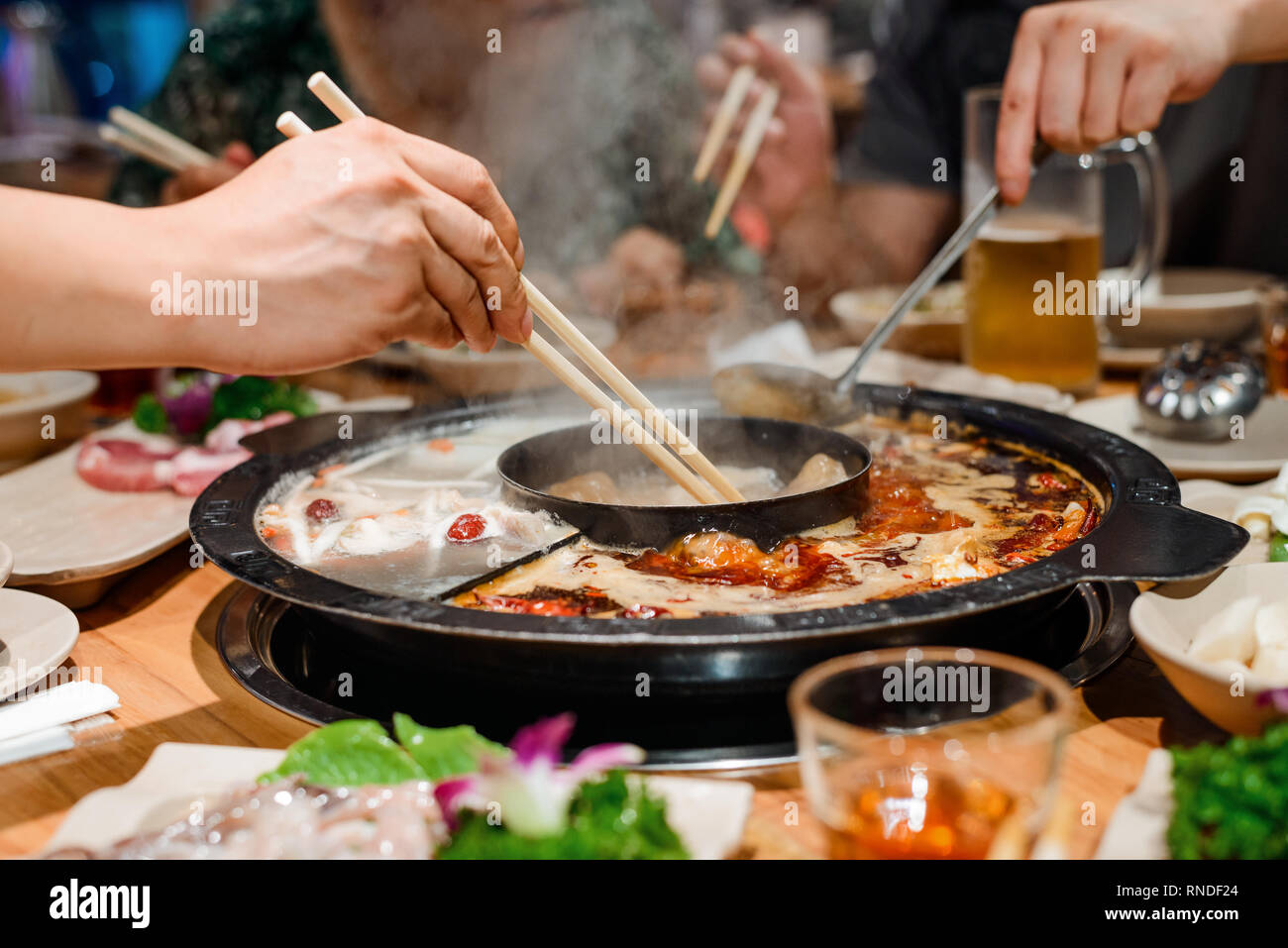 Communal pot hi-res stock photography and images - Alamy