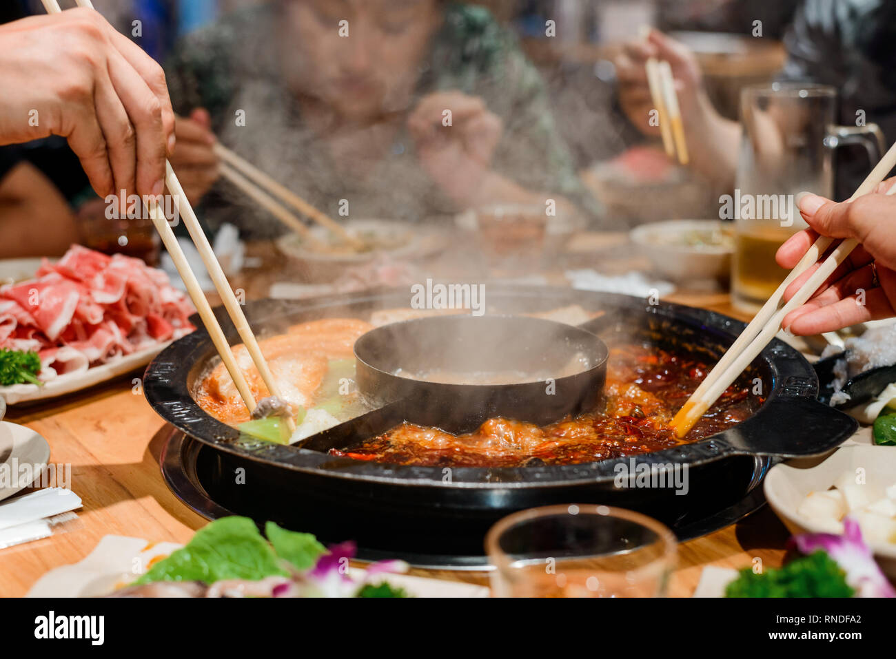 People taking food Stock Photo - Alamy