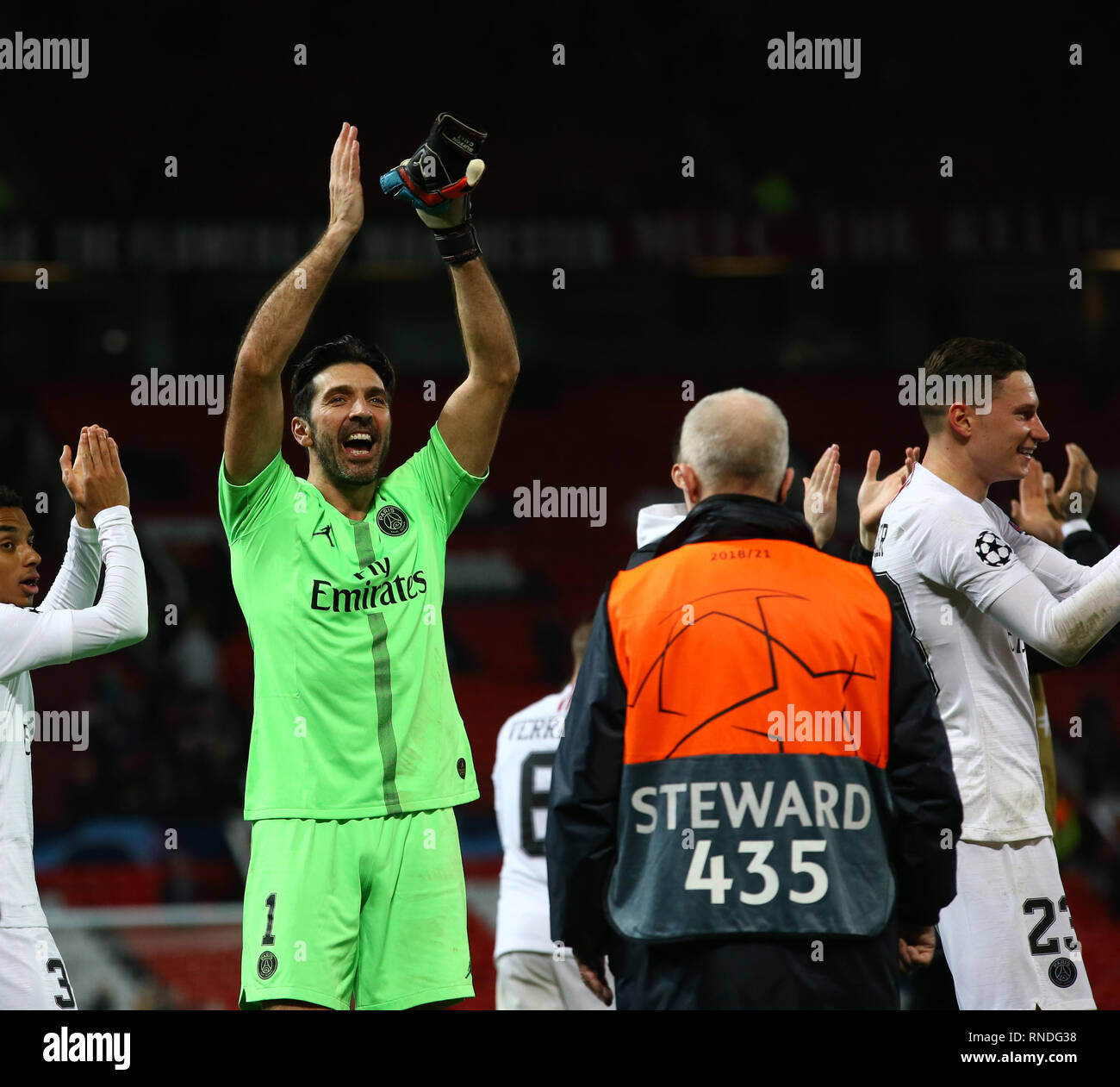 MANCHESTER, ENGLAND - FEBRUARY 12 2019: PSG players acknowledge their ...