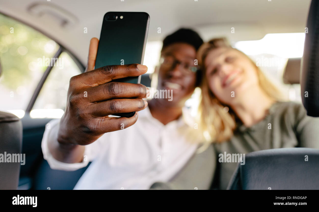 Couple on backseat in car hi-res stock photography and images - Alamy