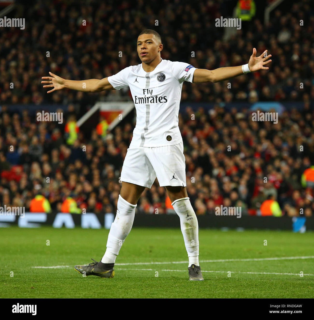 MANCHESTER, ENGLAND - FEBRUARY 12 2019: Kylian Mbappe of PSG celebrates ...