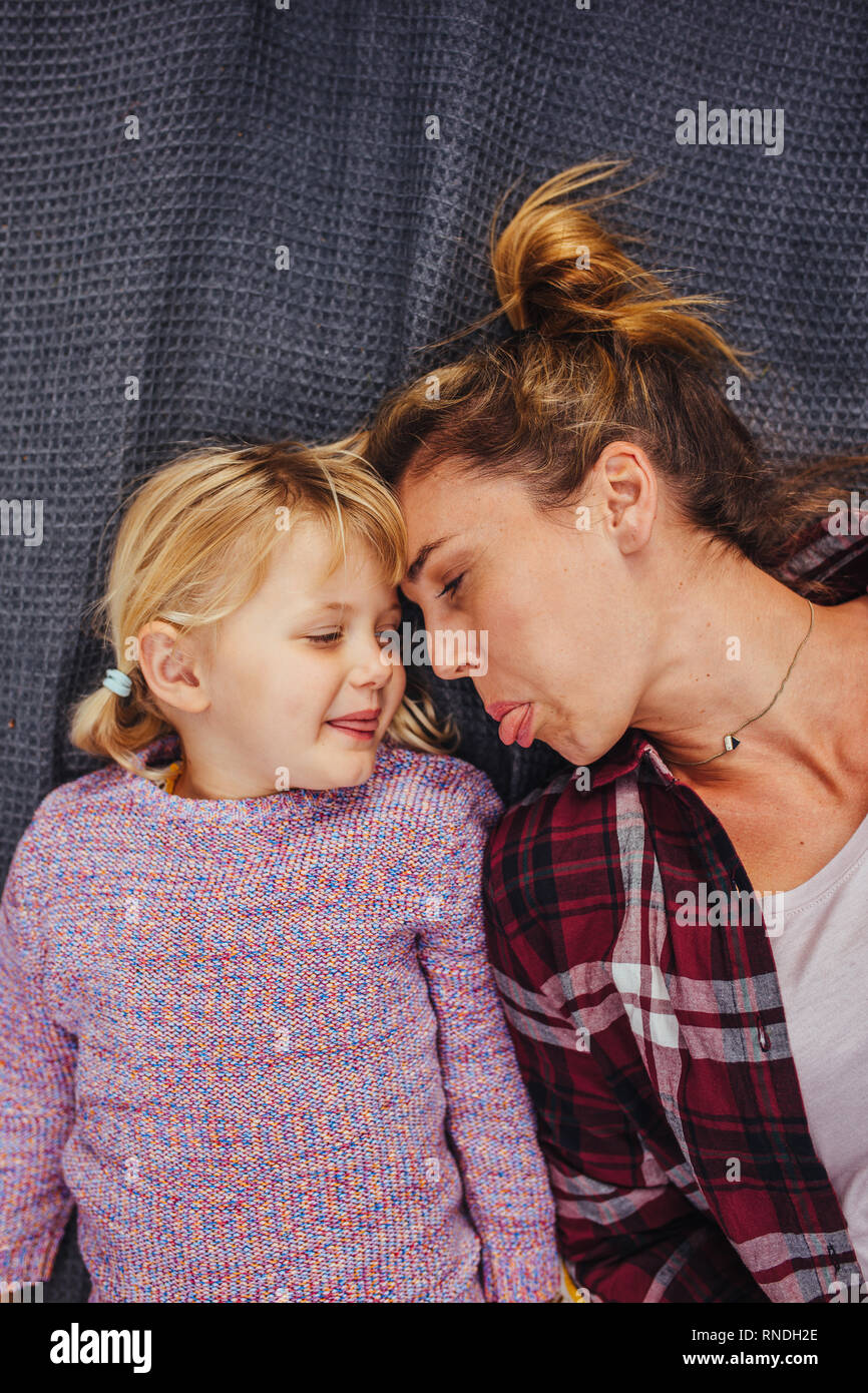 Heads together faces touching hi-res stock photography and images - Alamy