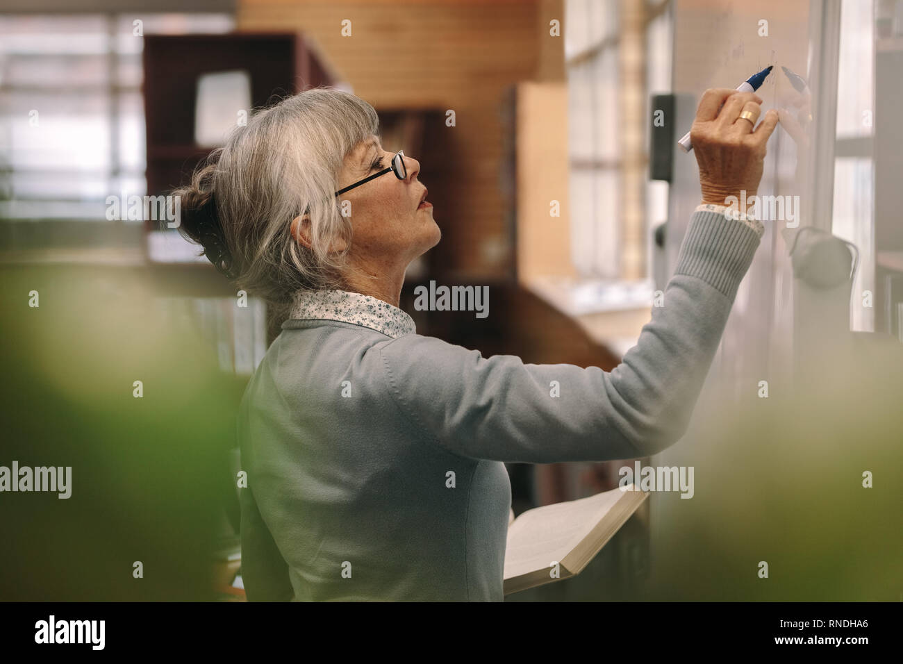 Elderly teacher hi-res stock photography and images - Alamy