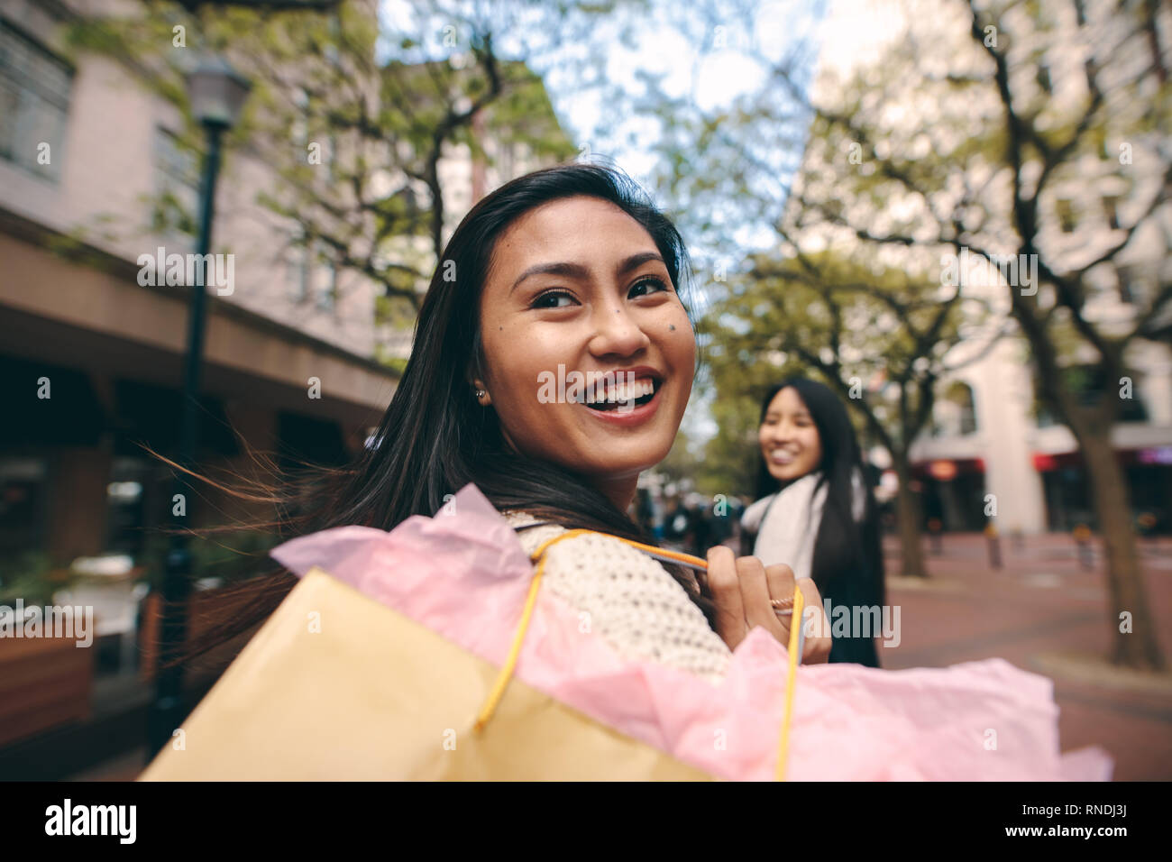 Trendy woman out shopping hi-res stock photography and images - Alamy