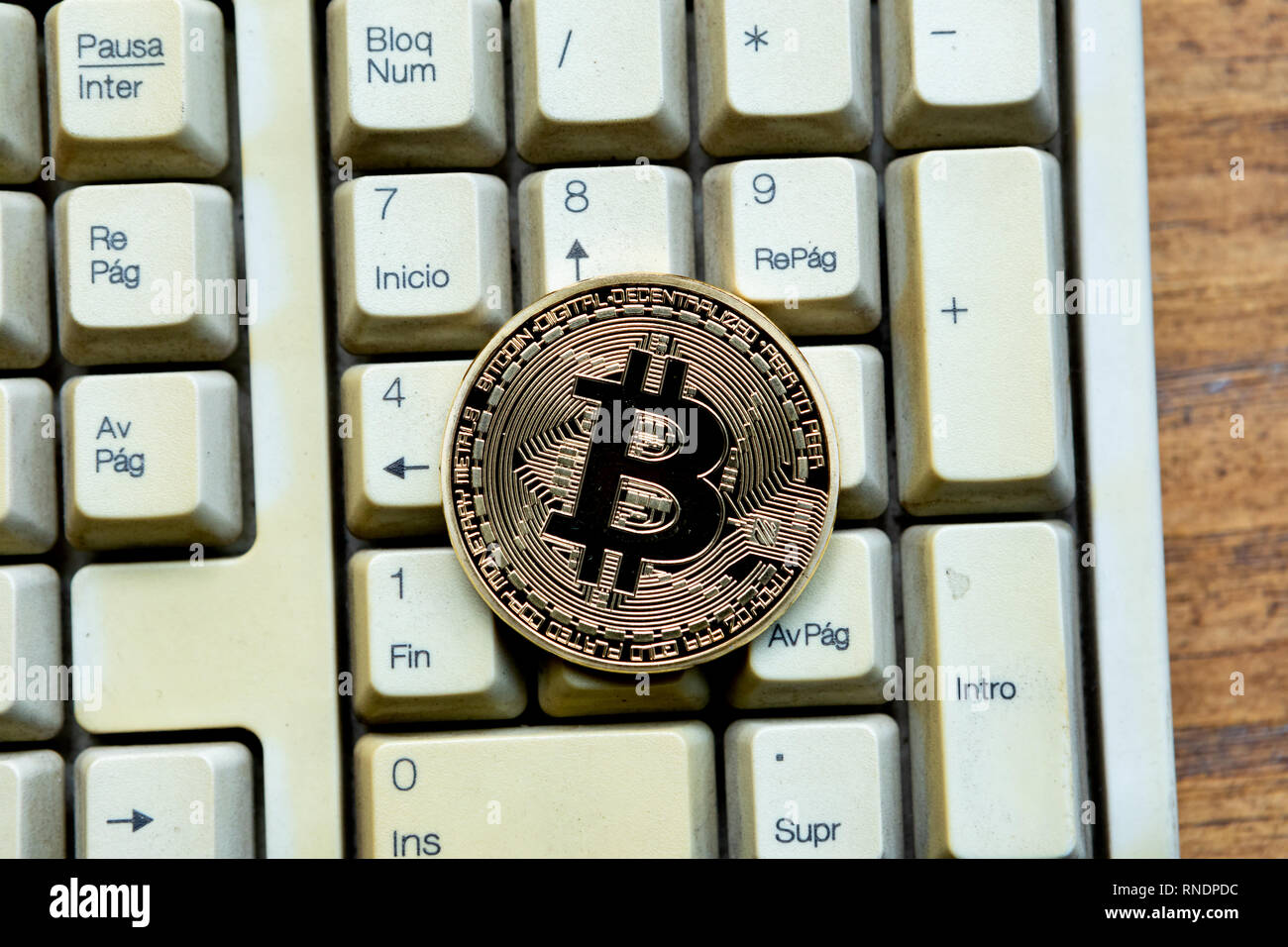 Golden Bitcoin Coin Close Up Isolated on a keyboard Stock Photo - Alamy