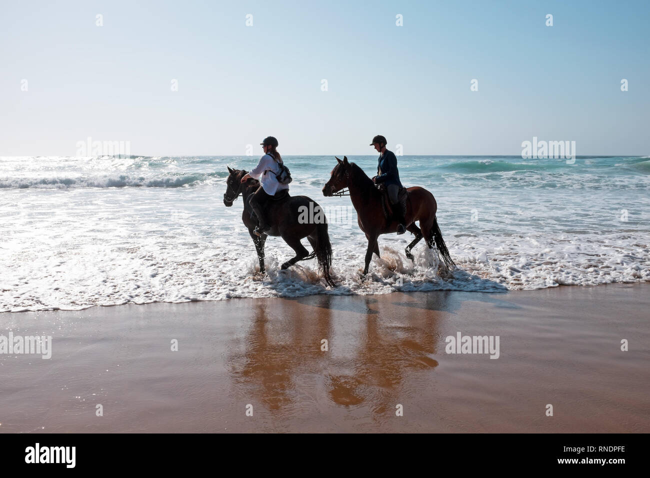 Horse riding in the water hi-res stock photography and images - Alamy