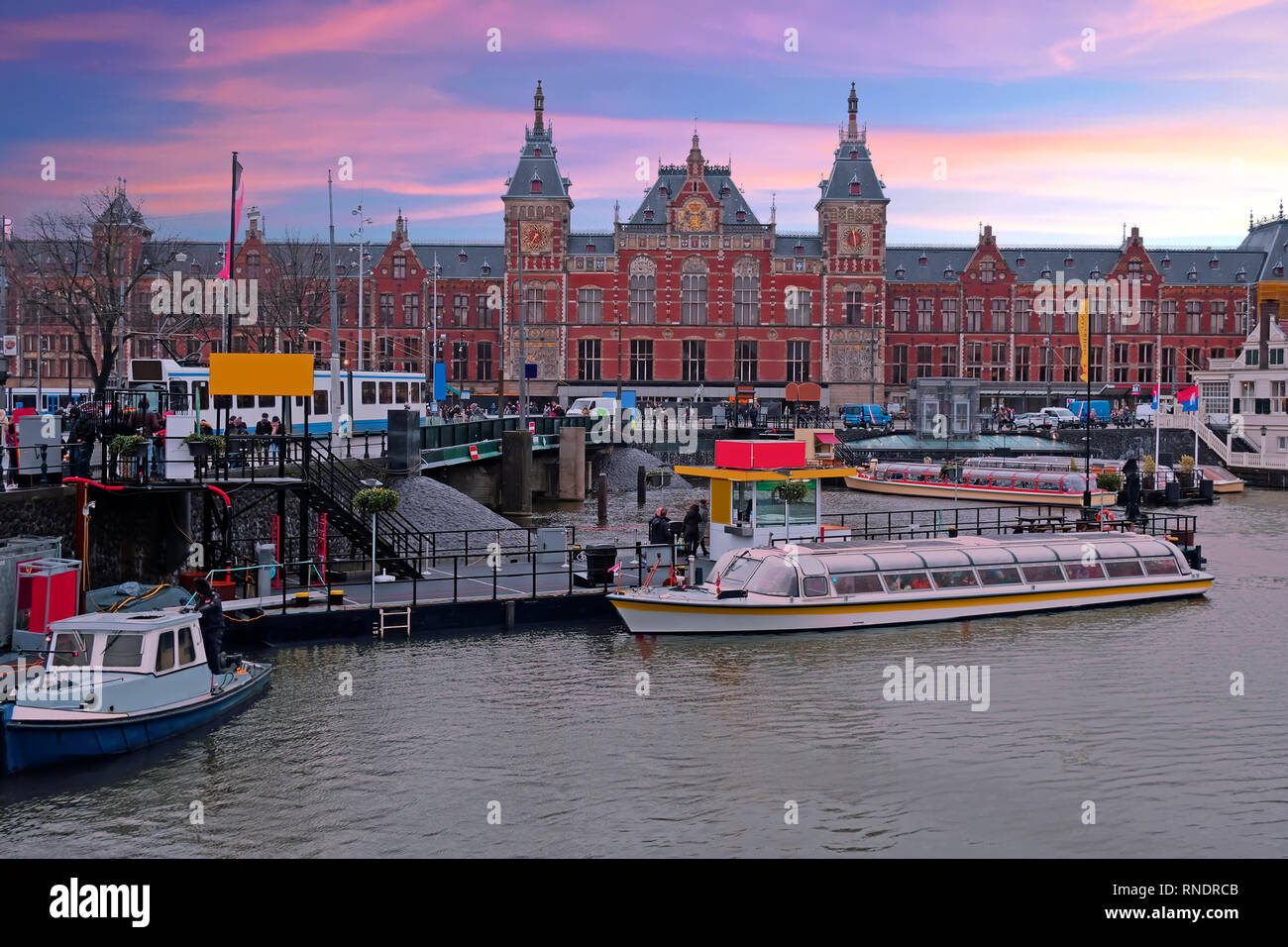 City scenic from Amsterdam in the Netherlands with the Central Station ...