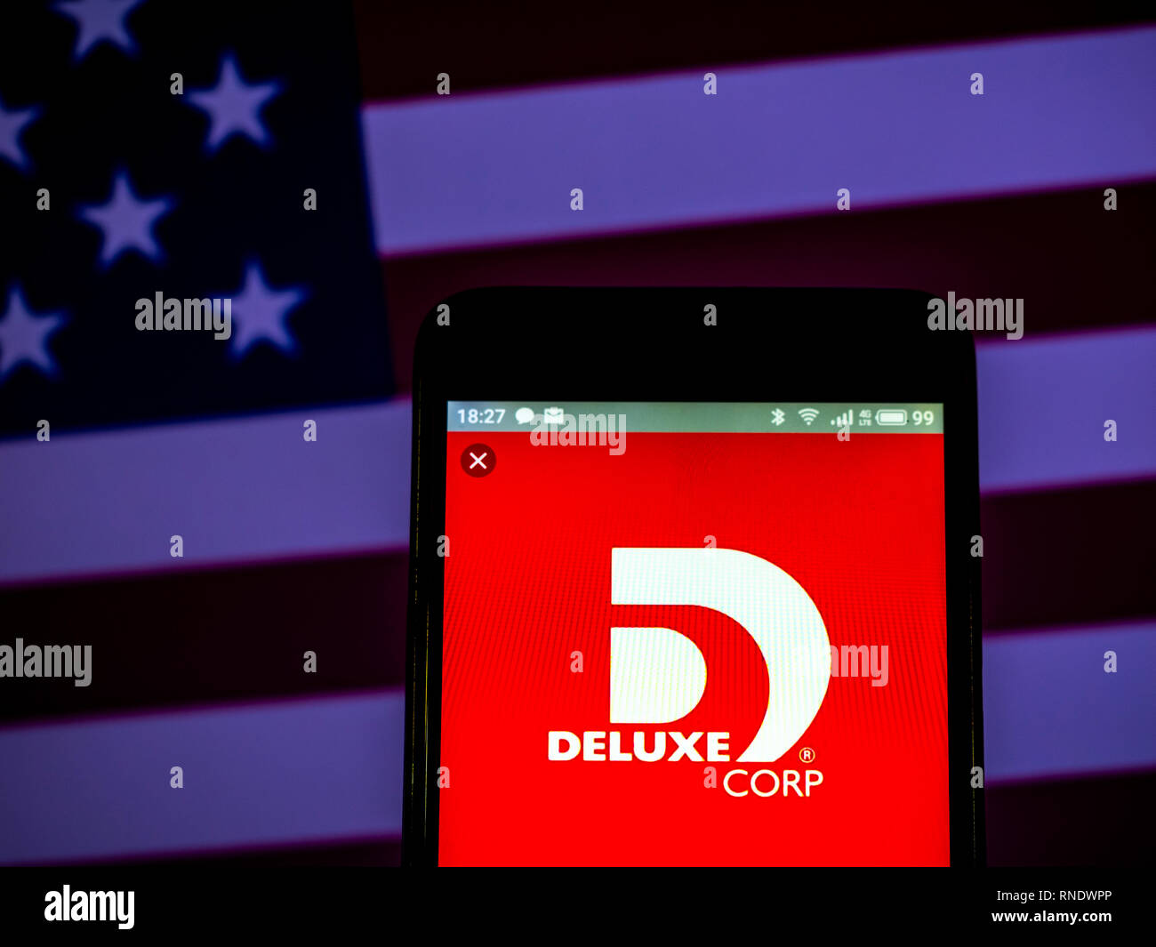 Deluxe Corporation logo seen displayed on smart phone Stock Photo - Alamy