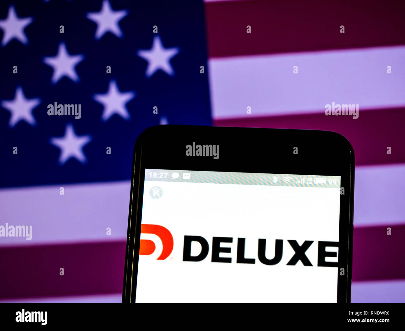 Deluxe Corporation logo seen displayed on smart phone Stock Photo - Alamy
