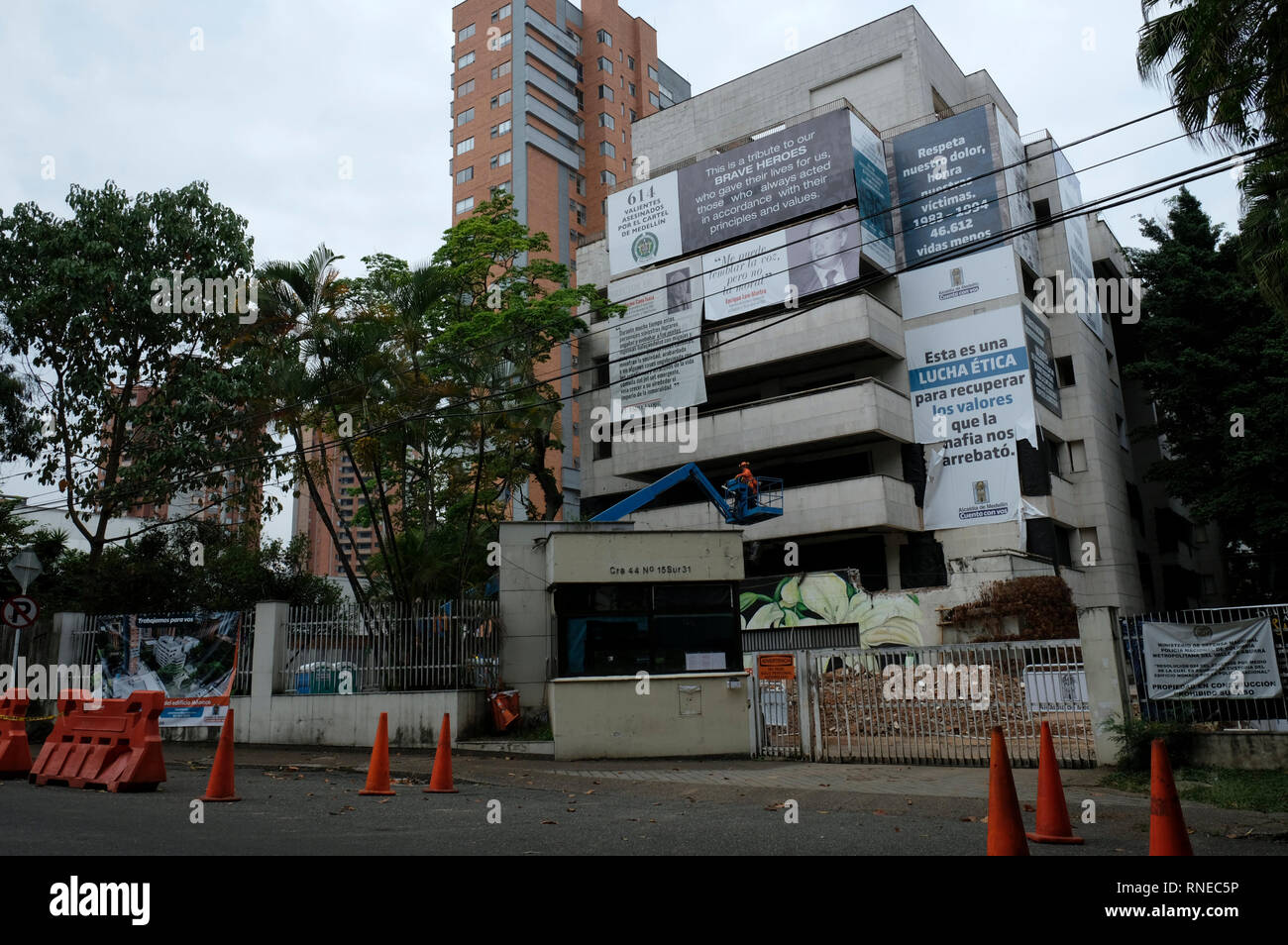 A worker from the company in charge of the demolition is seen at the ...
