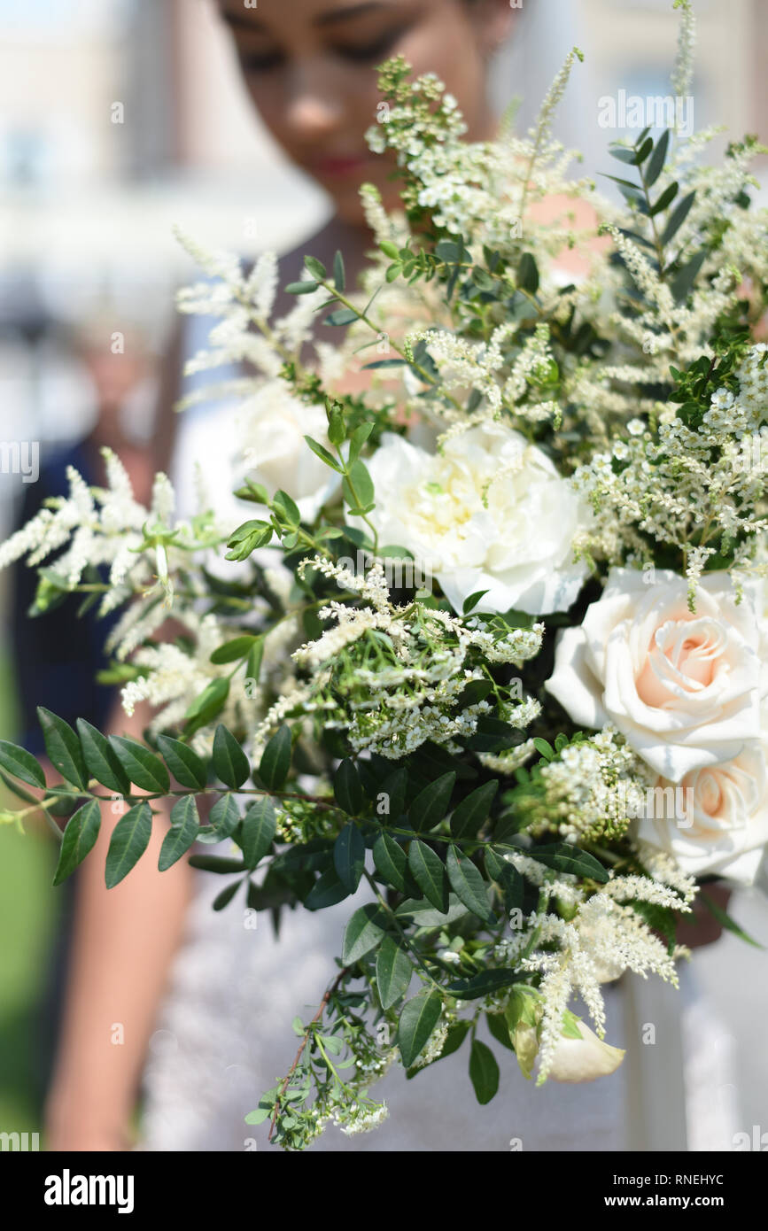 Beautiful white couple get married by the sea on a glorious Summer day ...