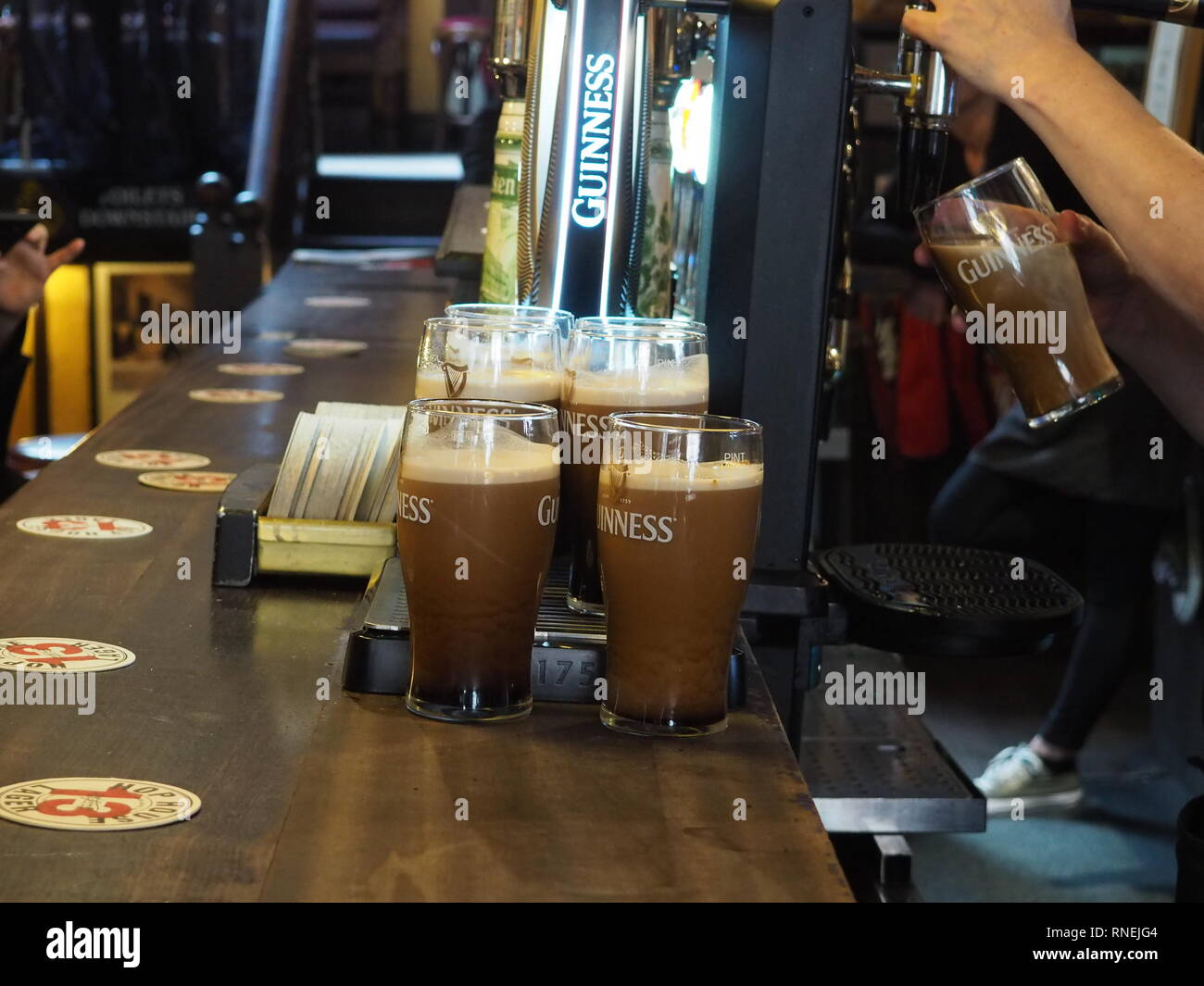 Guinness being poured in a pub in Dublin - Ireland Stock Photo - Alamy