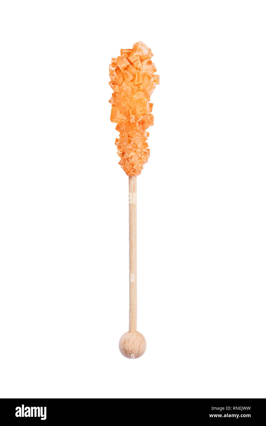 Rock candy or orange sugar candy isolated on white background ...