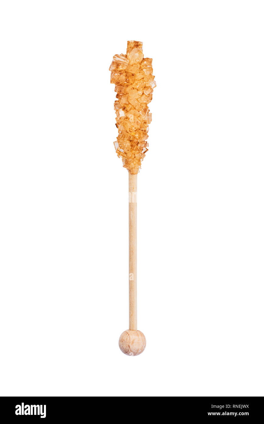 Rock candy or yellow sugar candy isolated on white background ...
