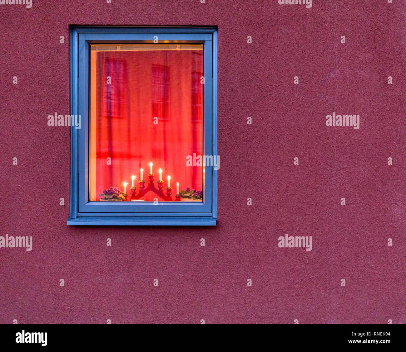 Exterior view of window lit up by Christmas Advent bridge lights Stock ...