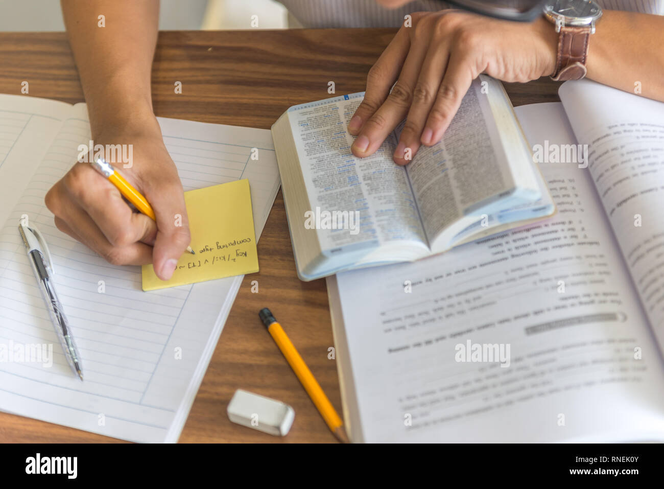 Looking at the dictionary hi-res stock photography and images - Alamy