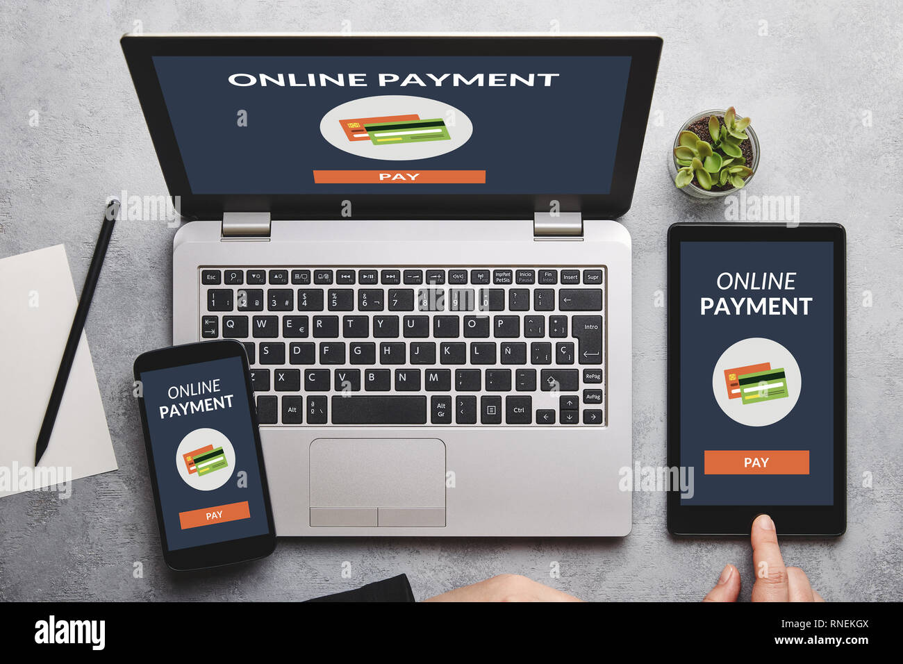 Online payment concept on laptop, tablet and smartphone screen over ...