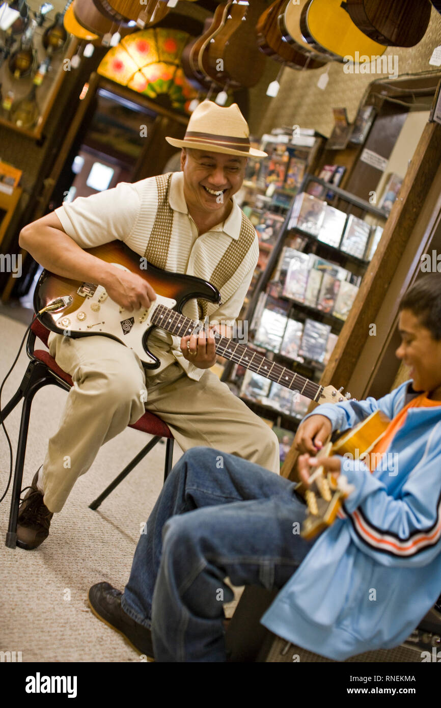 African american children playing instruments hi-res stock photography ...