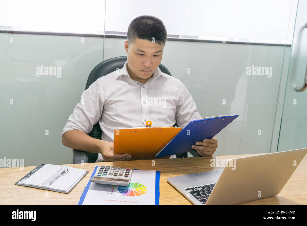 Checking financial plan hi-res stock photography and images - Alamy