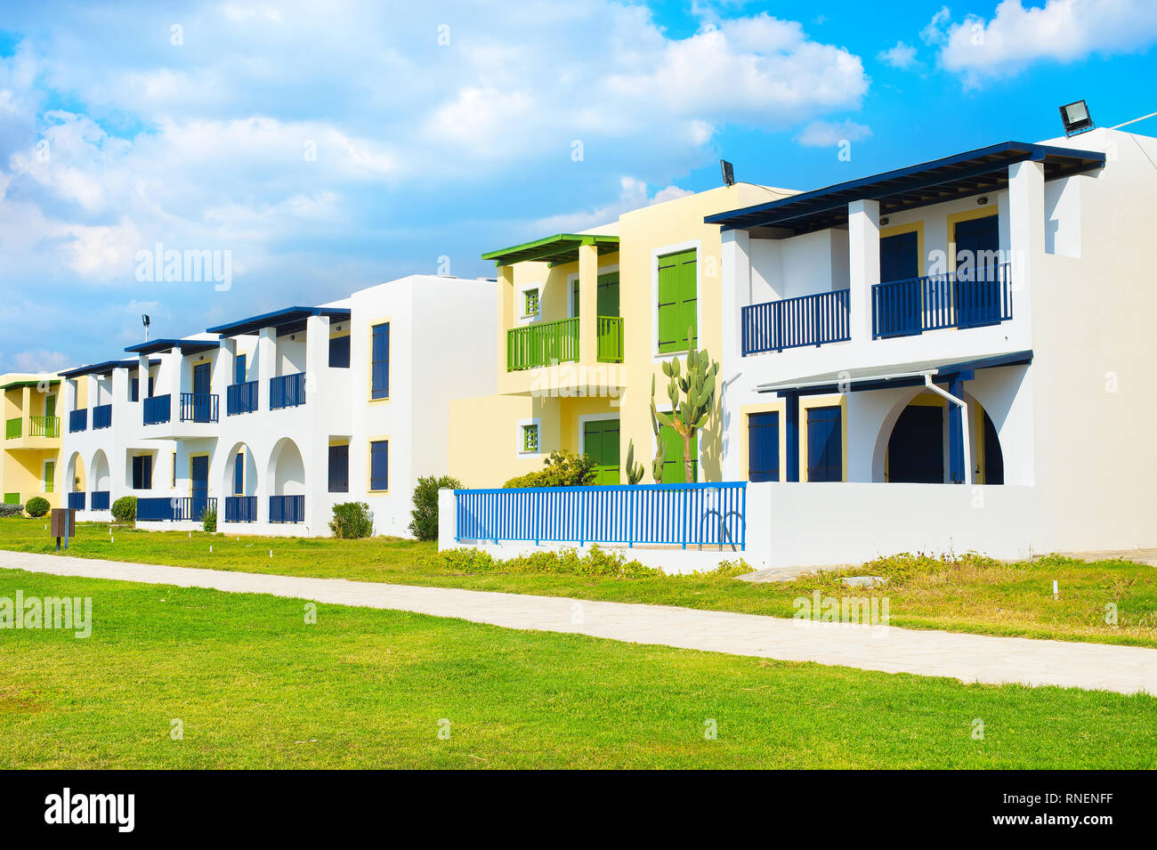 Colorful tourist apartments in the sunny day. Paphos, Cyprus Stock ...