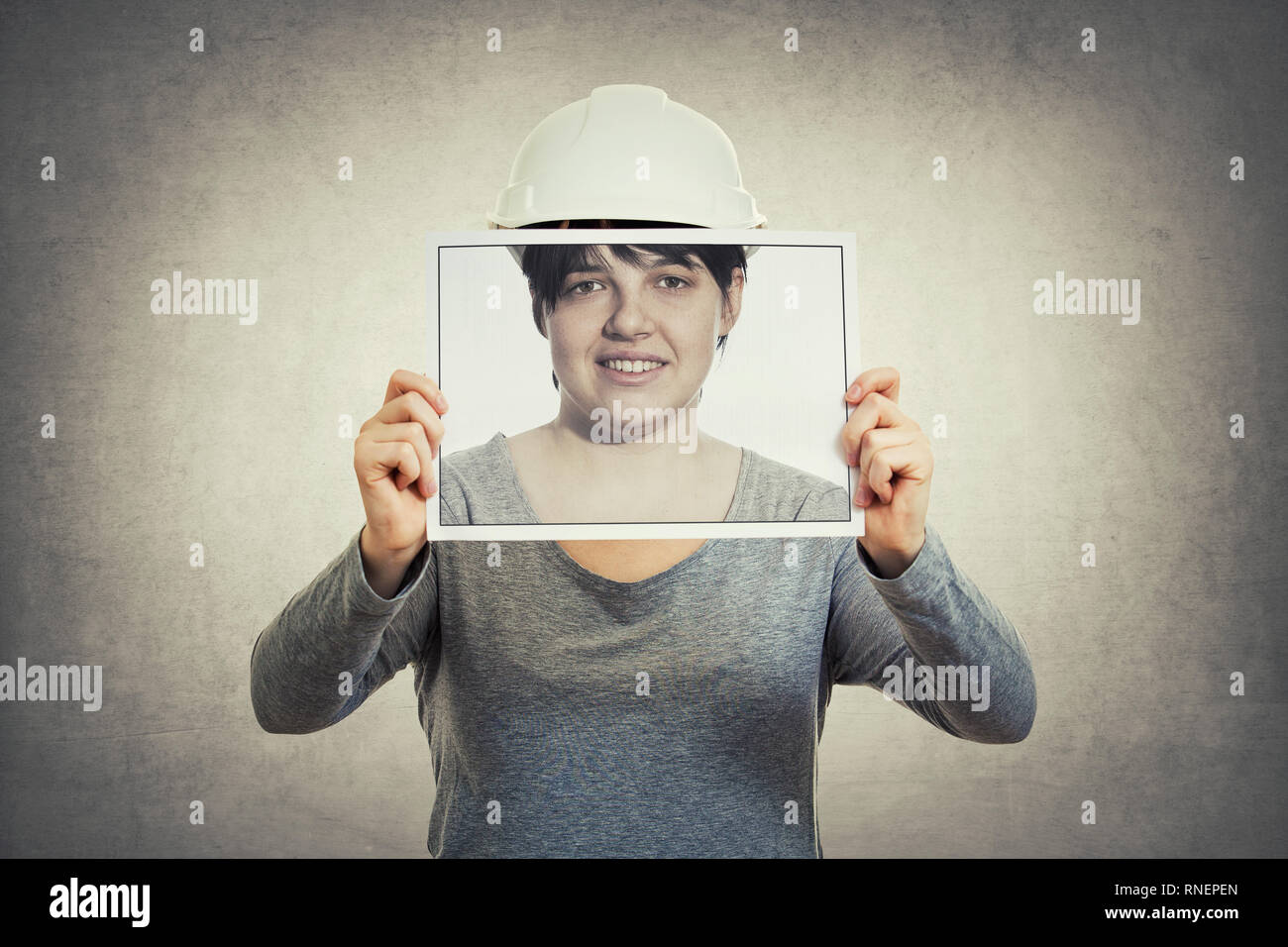 Construction worker female hide face hi-res stock photography and ...