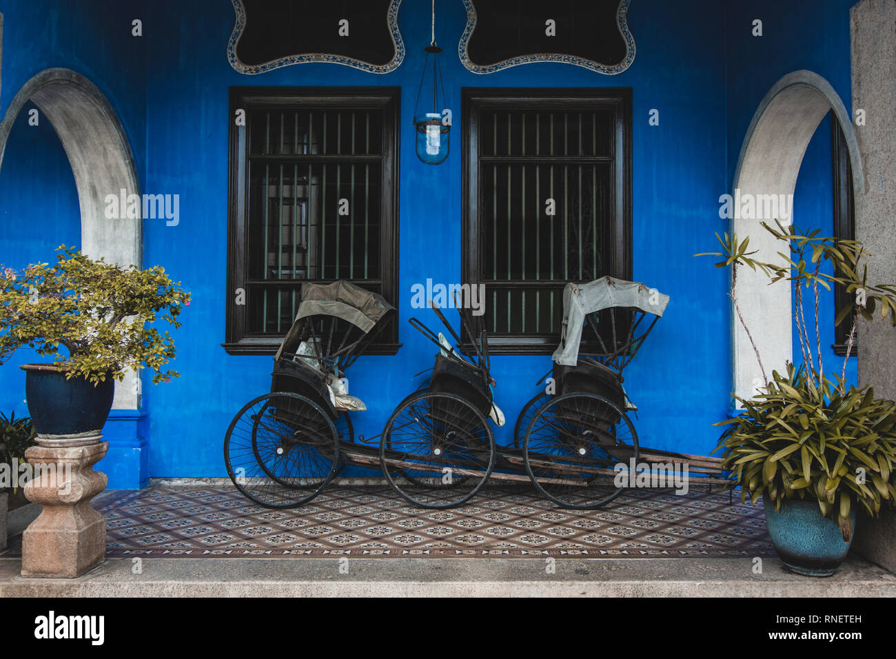 Rickshaws by the Blue Mansion, Georgetown, Malaysia Stock Photo - Alamy