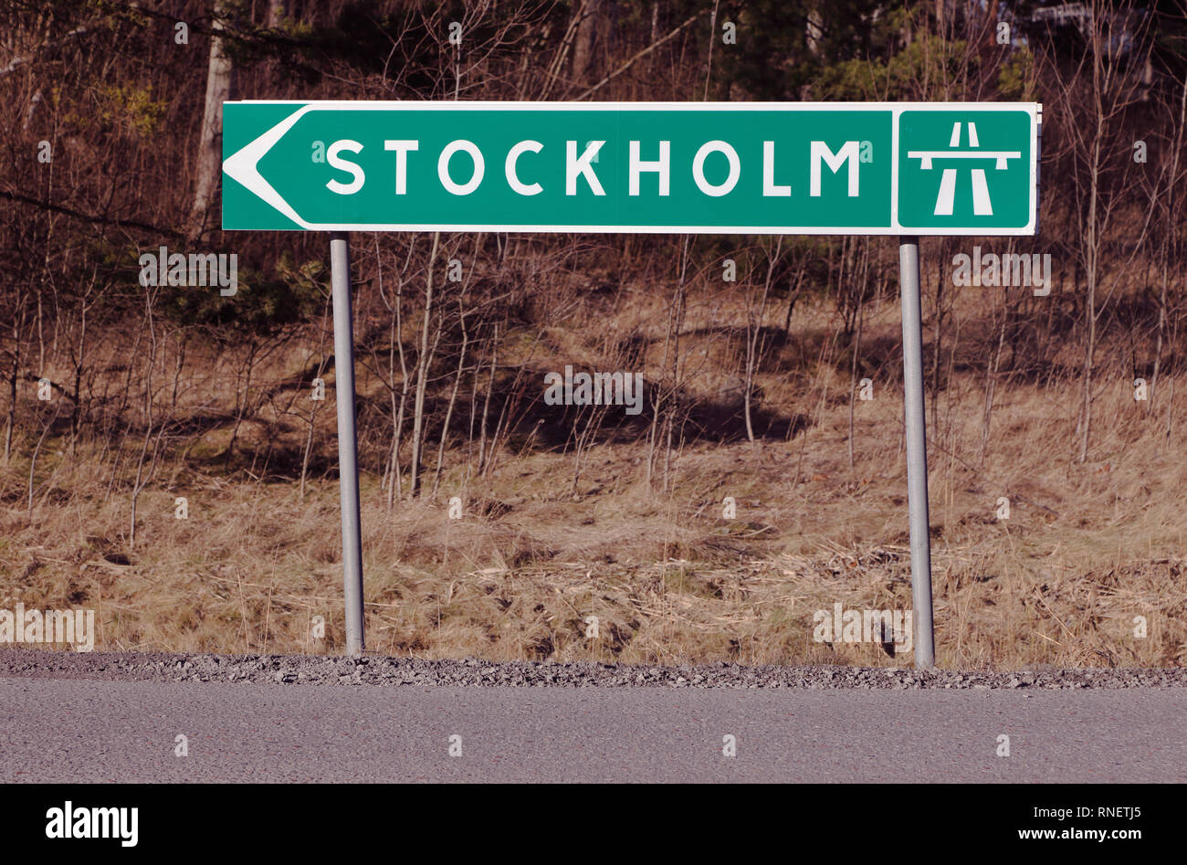 Green motorway signpost pointing out the direction to Stockholm Stock ...