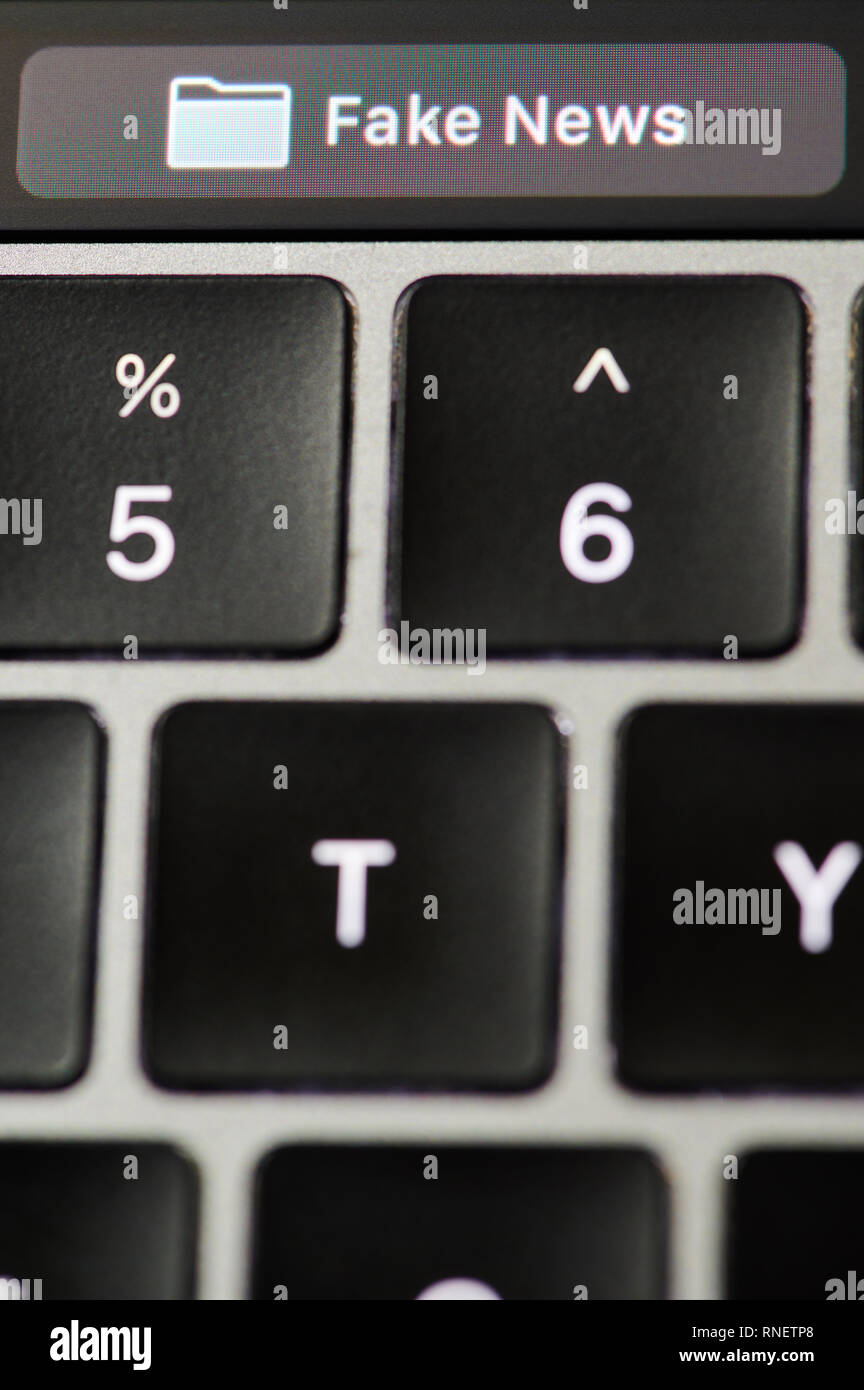 Fake news folder in computer storage. Propaganda theme Stock Photo - Alamy
