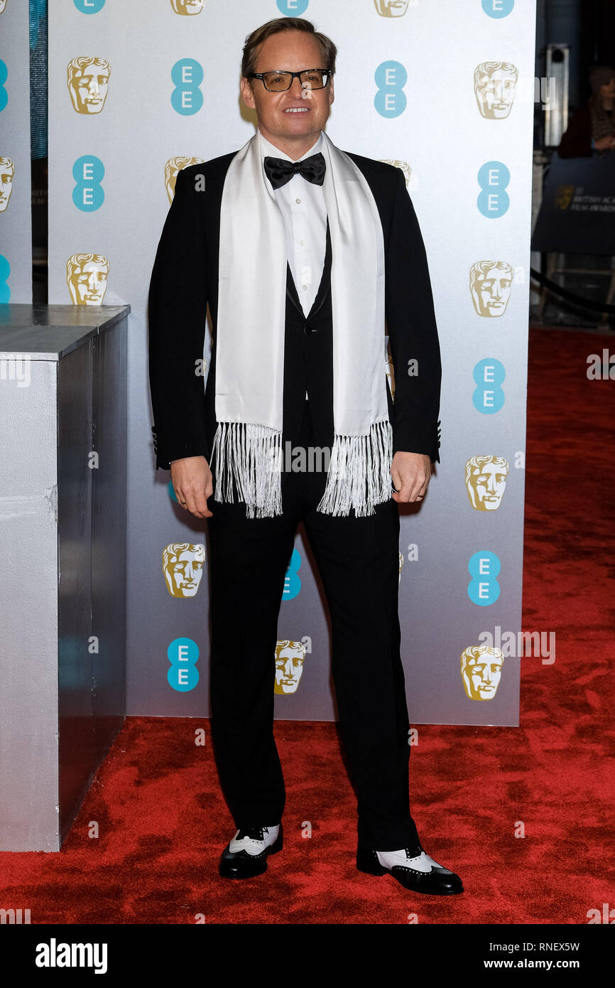 John S. Baird poses on the red carpet at the British Academy Film ...