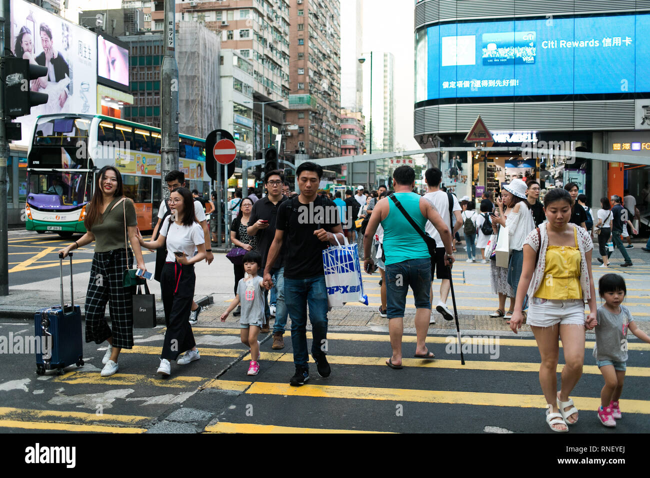 Busy streets packed with People. Hong Kong is one of the most densely ...