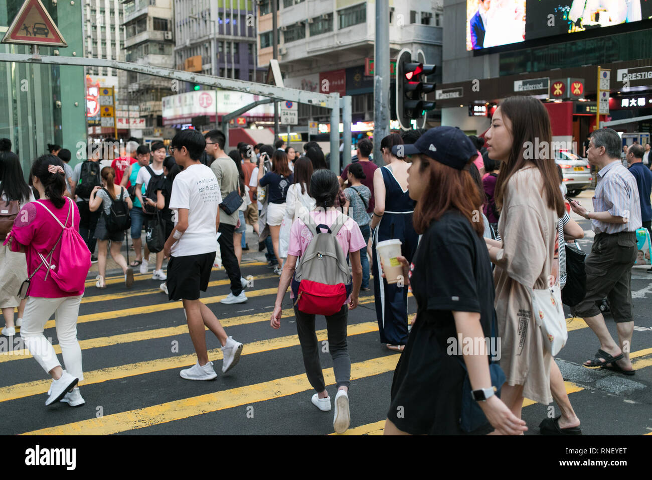 Busy streets packed with People. Hong Kong is one of the most densely ...
