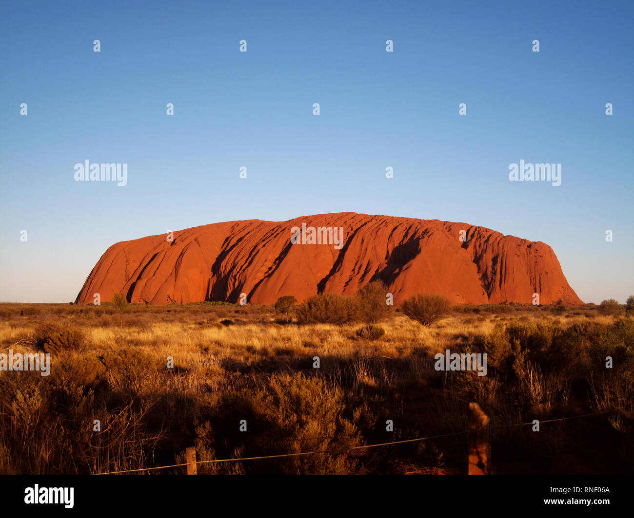 Majestic Uluru at sunset on a clear winter's evening Stock Photo - Alamy