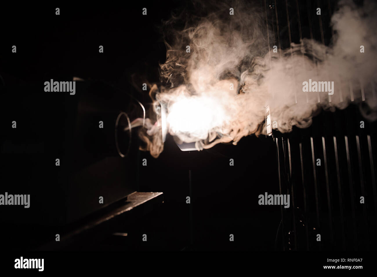 lights in smoke, studio lights shining through the smoke Stock Photo ...