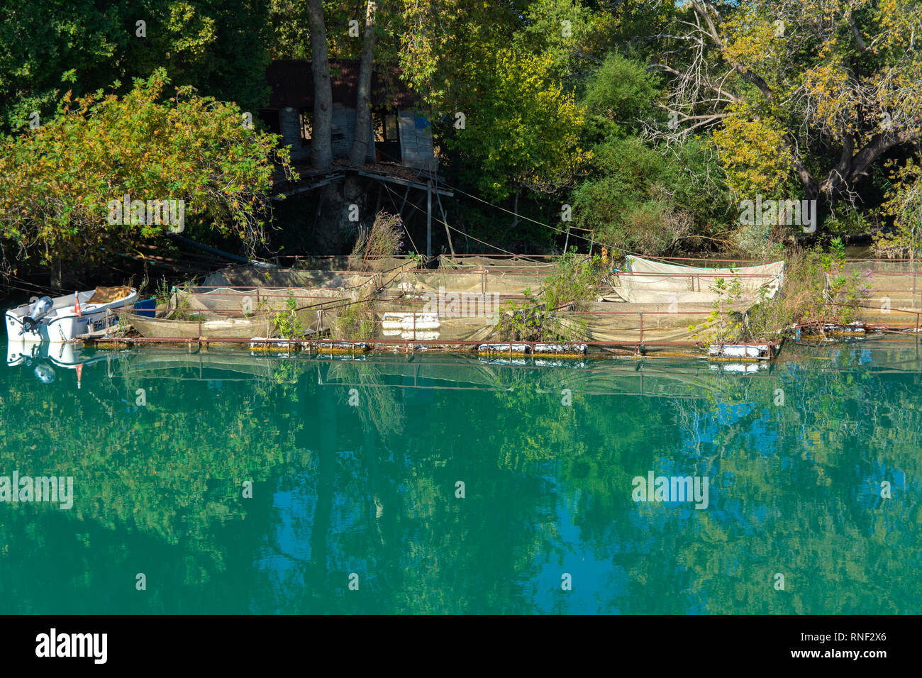 Artificial breeding of fish. Tanks from the net in the open air farm ...