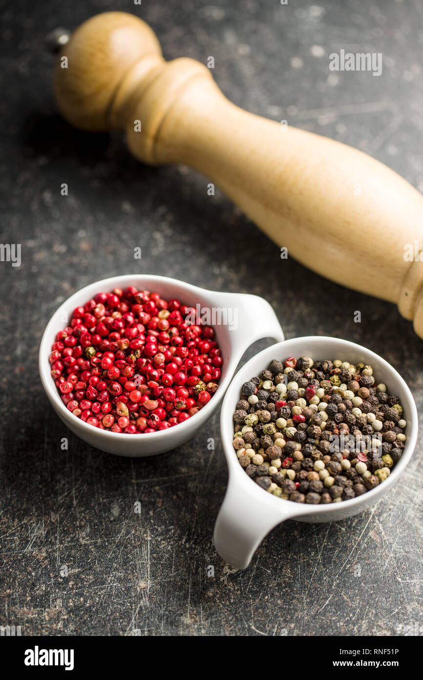 Different types of dried peppercorn in bowl Stock Photo - Alamy