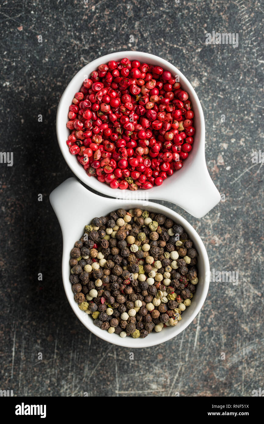 Different types of dried peppercorn in bowl Stock Photo - Alamy