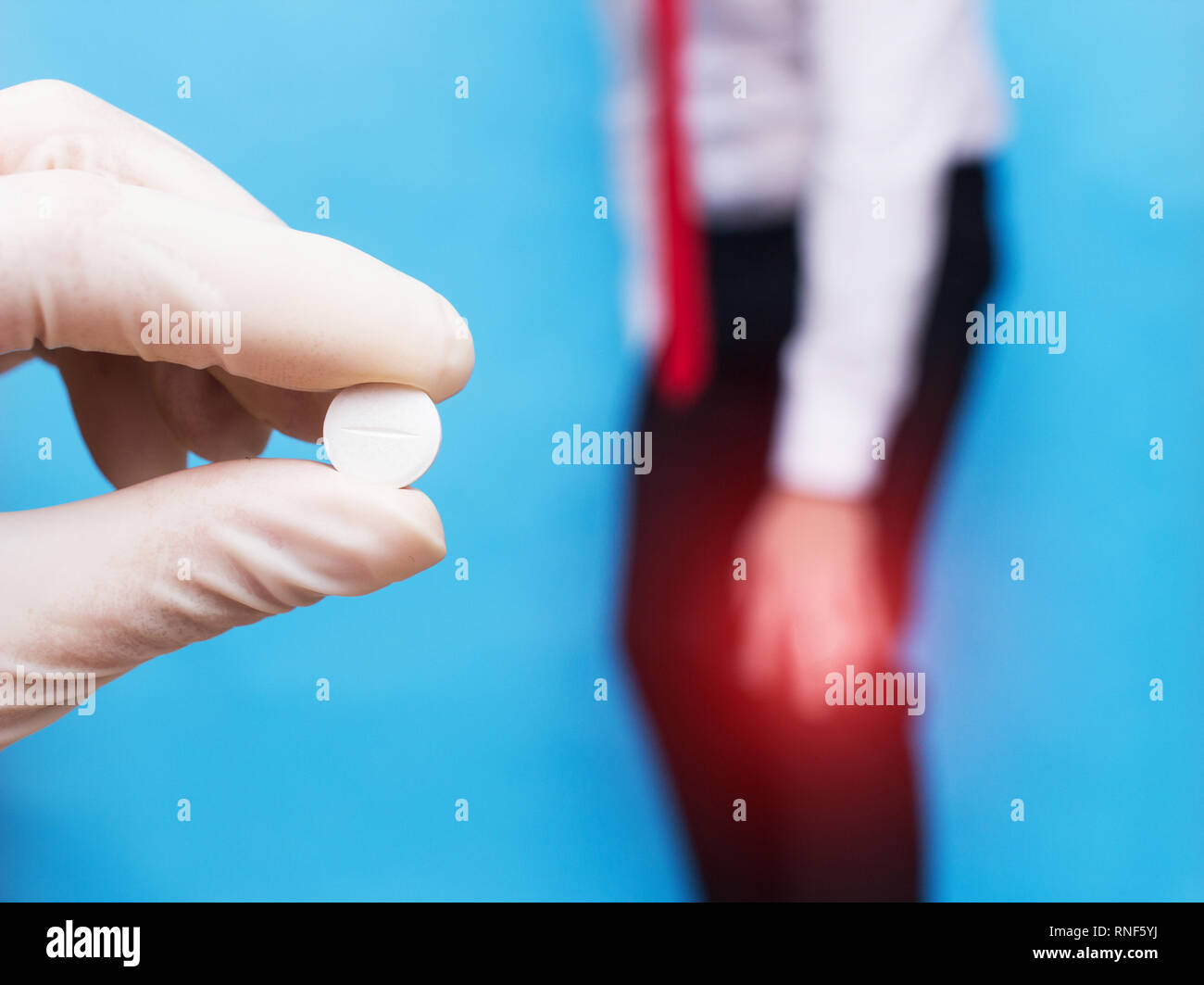 Male office worker holds sore knee joint, pain and inflammation in knee ...