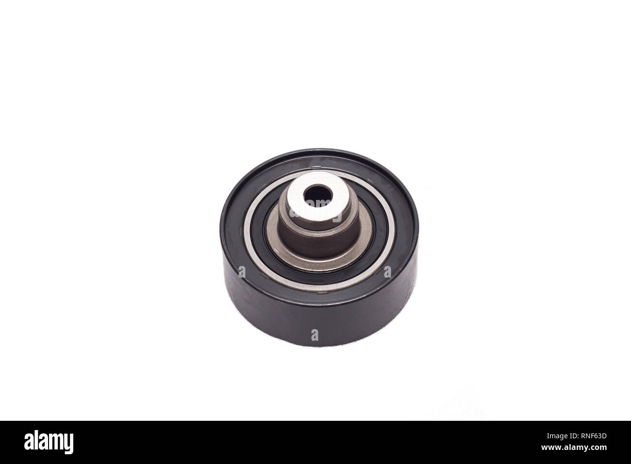 Bypass automobile roller timing system engine, white background, close ...