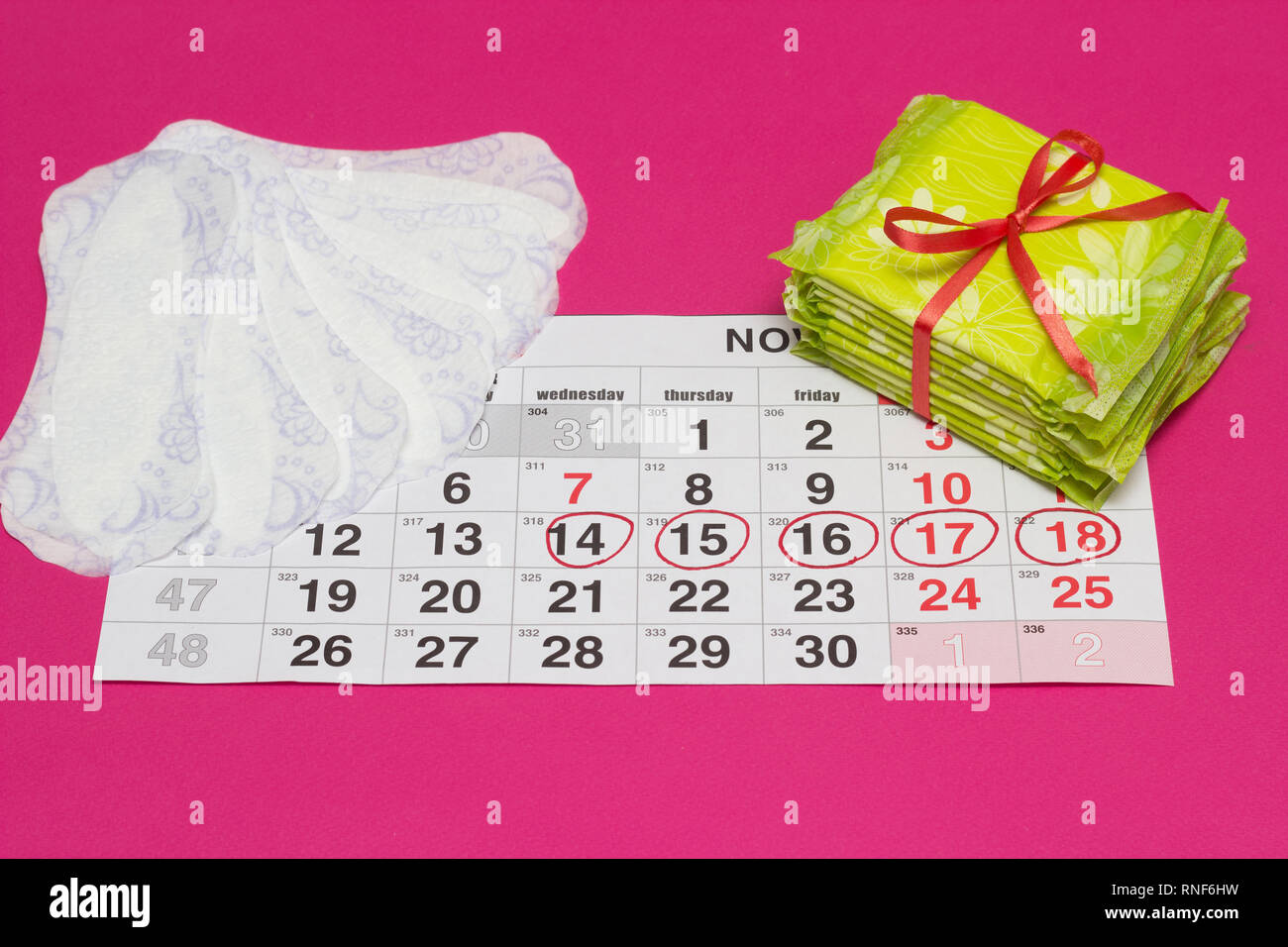 Women's calendar on which the hygiene and daily pads, gynecology, pink ...