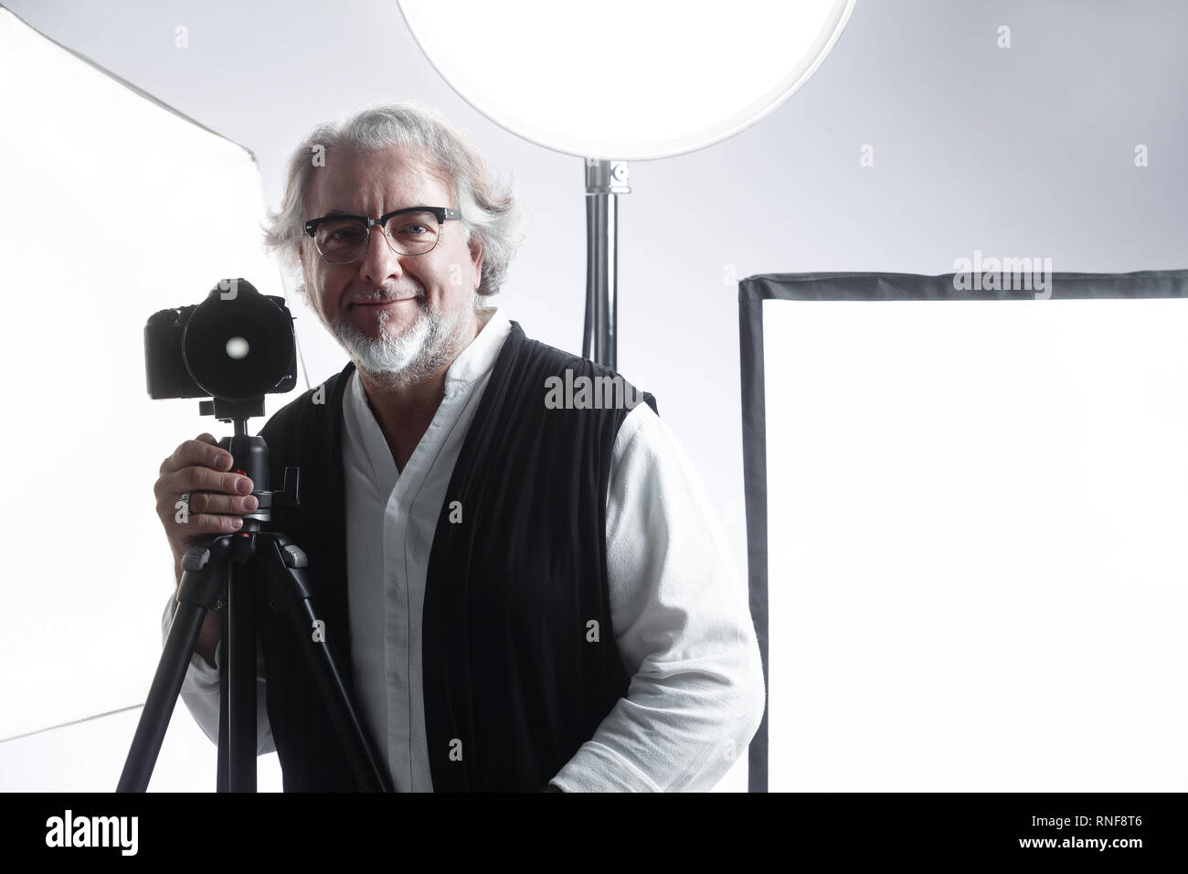 A professional photographer Stock Photo - Alamy