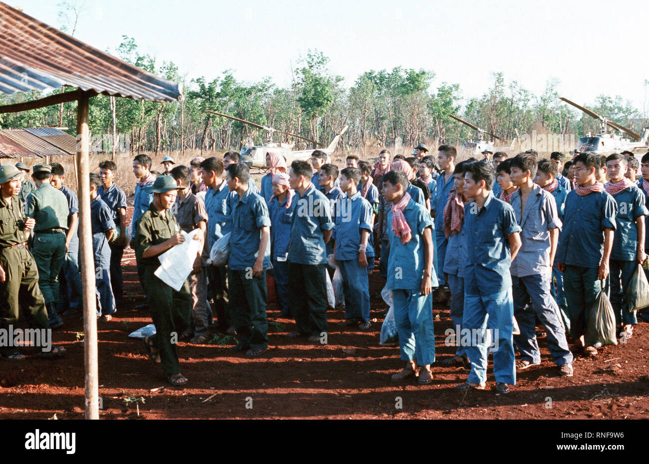 On a barren field near Loc Ninh South Vietnamese prisoners of war are ...